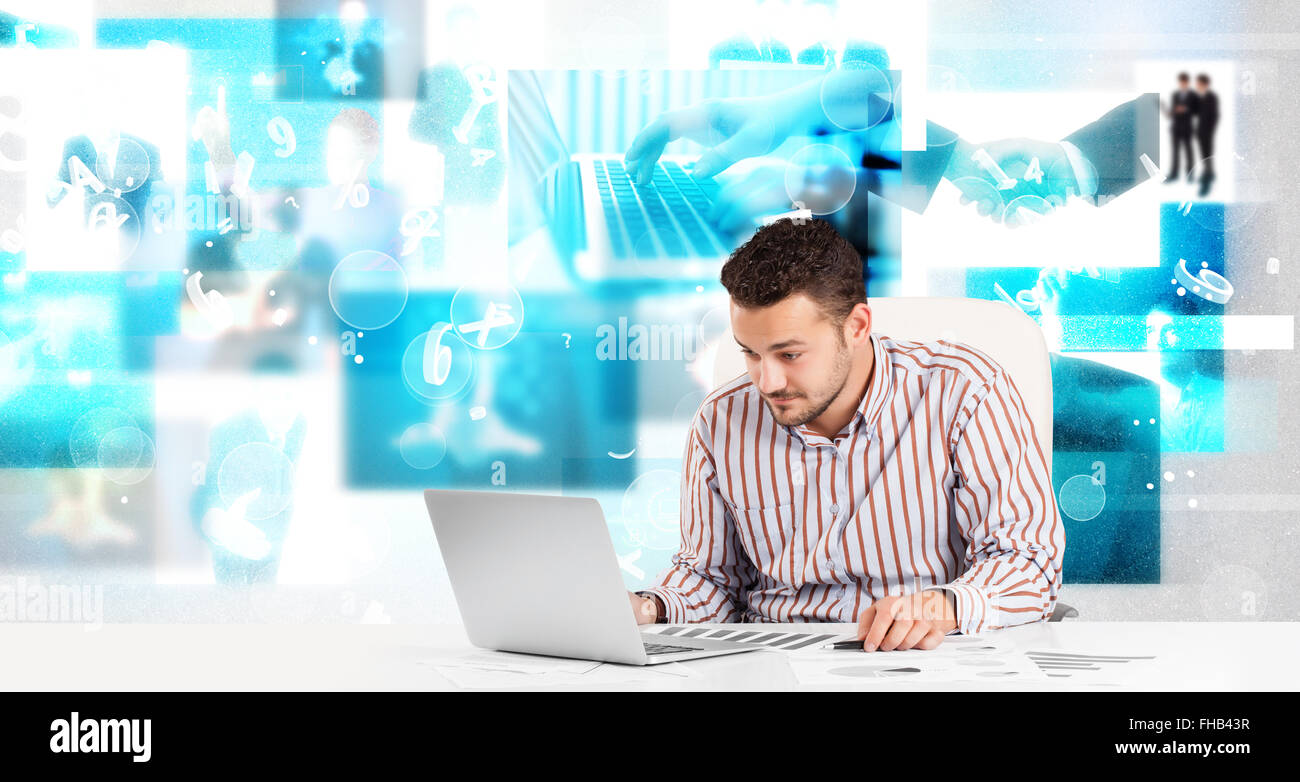 Business person at desk with modern tech images at background Stock ...