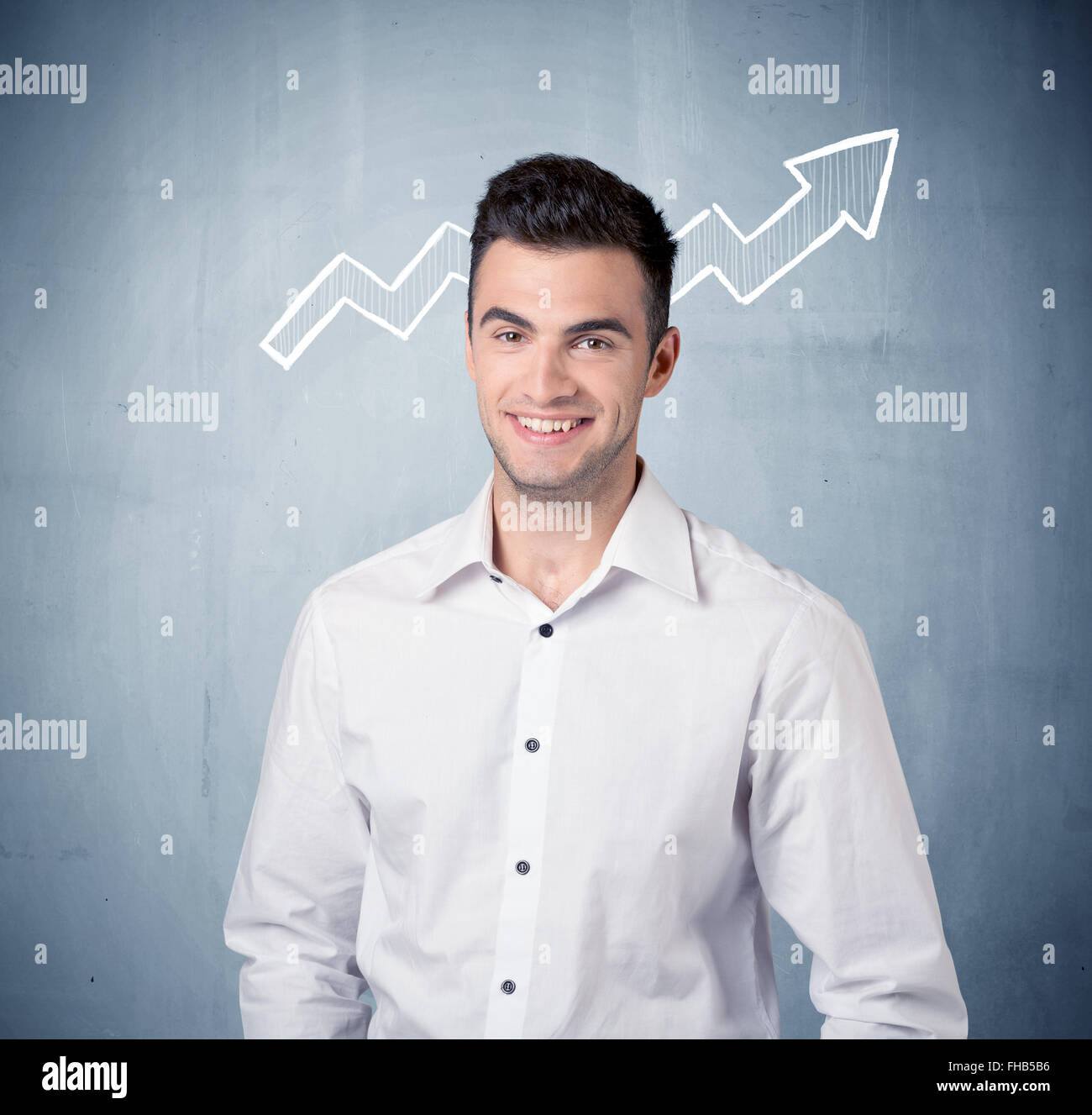 Smiling business guy with graph arrow Stock Photo - Alamy