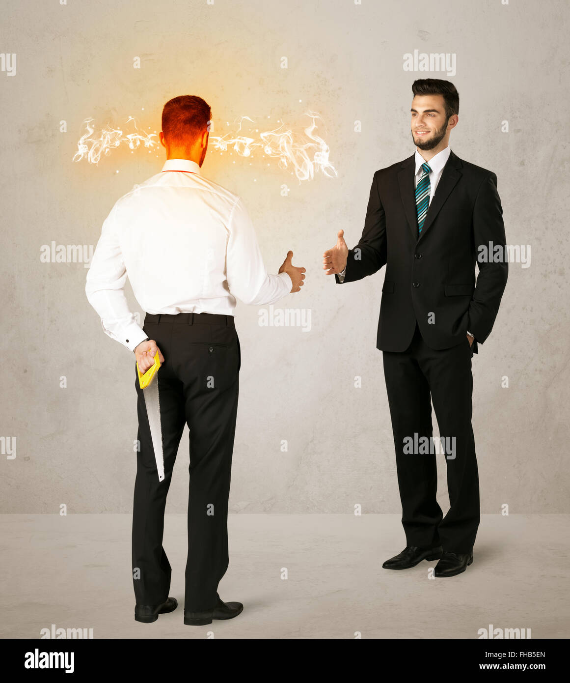 Angry businessman with weapon Stock Photo - Alamy