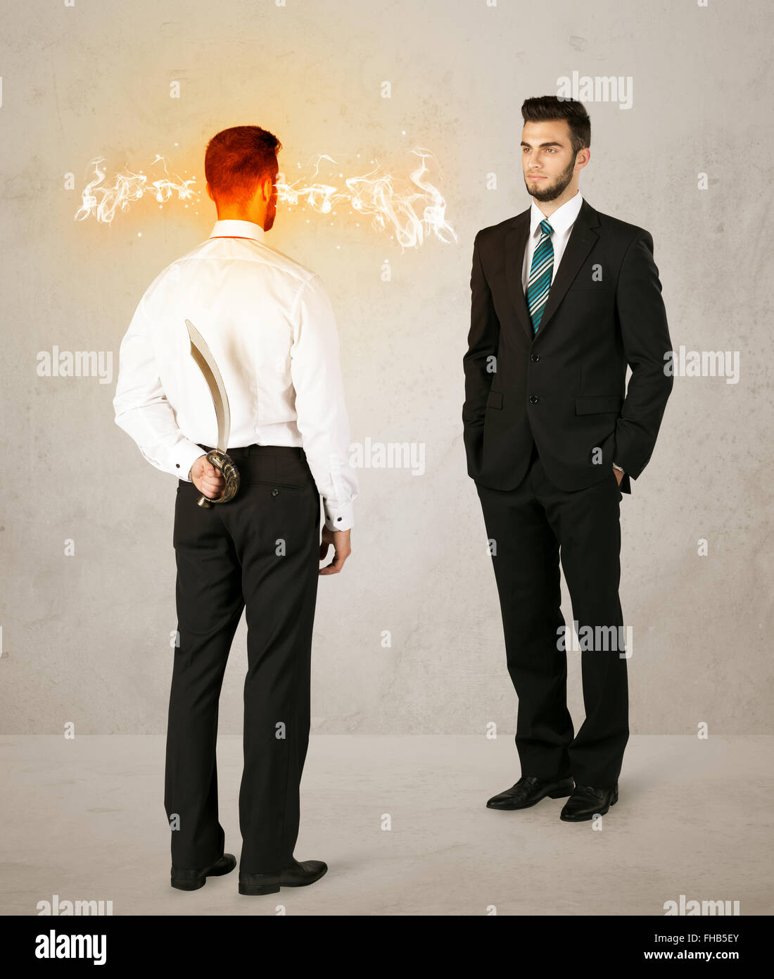 Angry businessman with weapon Stock Photo - Alamy