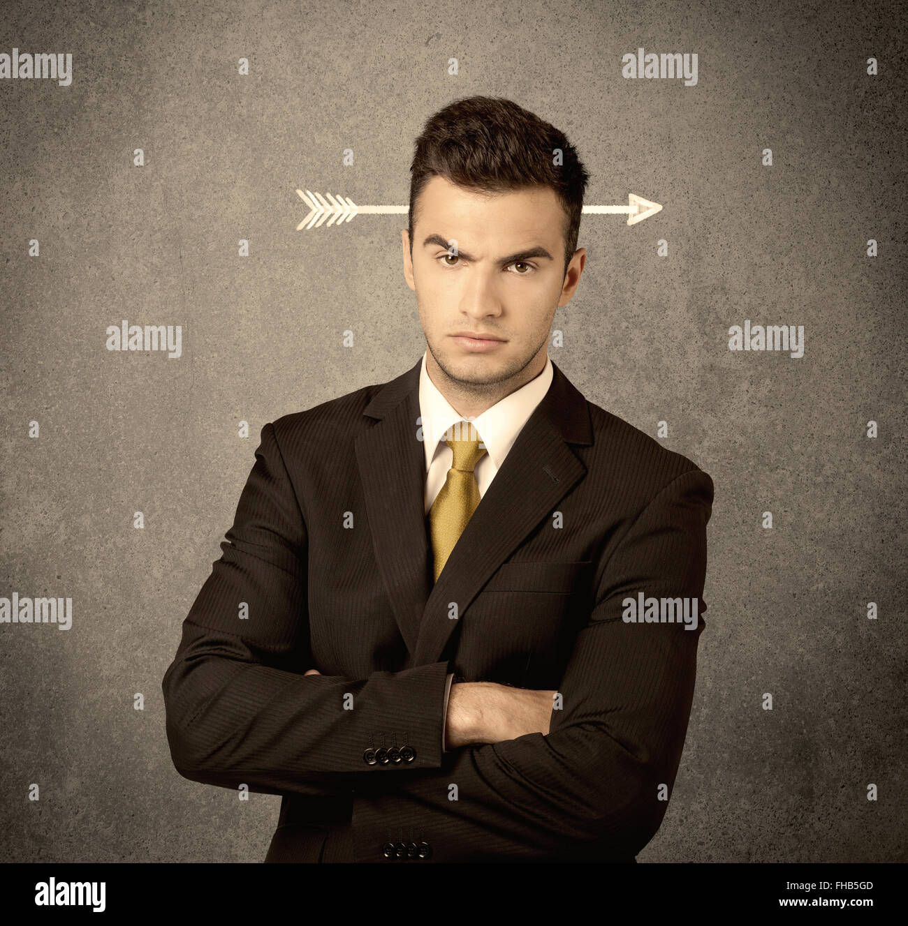 Young sales guy with arrow in the head Stock Photo - Alamy