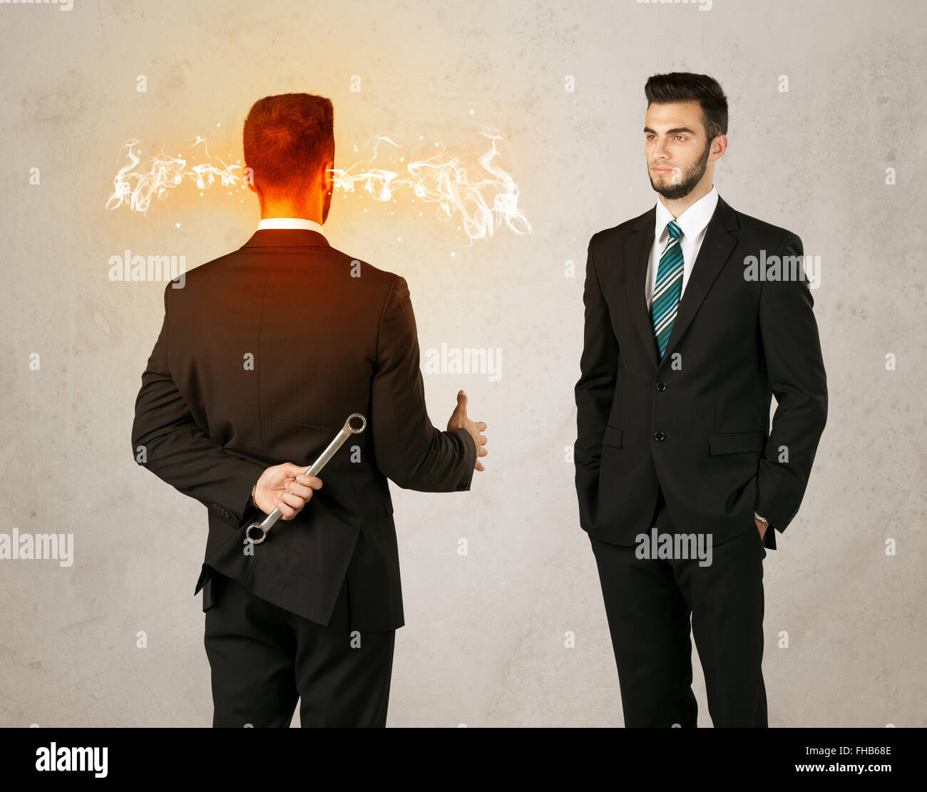 Angry businessman with weapon Stock Photo - Alamy