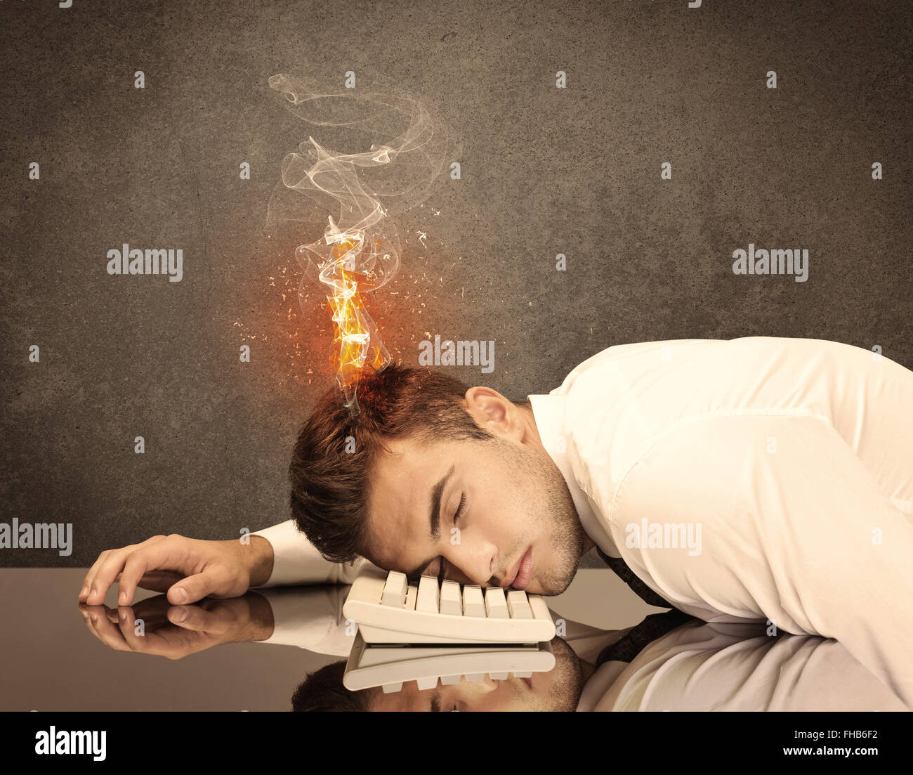 Sad business person's head catching fire Stock Photo - Alamy