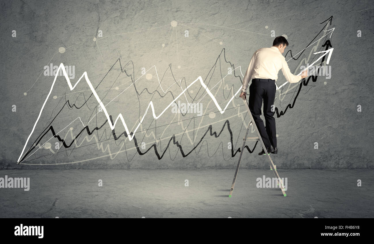 Man on ladder drawing lines Stock Photo - Alamy
