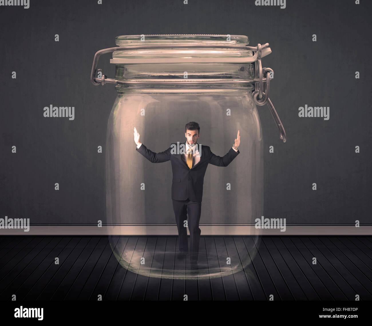 Businessman trapped into a glass jar concept Stock Photo - Alamy