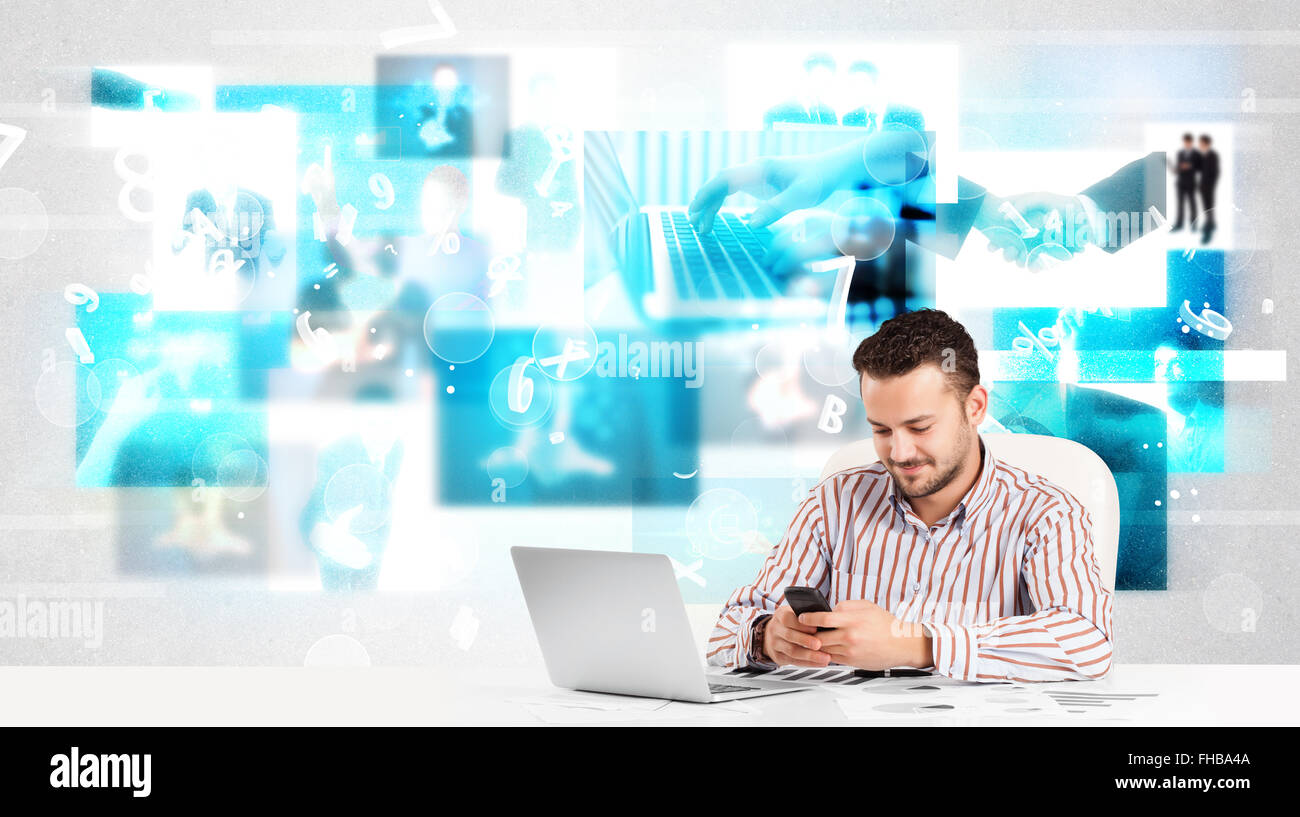 Business person at desk with modern tech images at background Stock ...
