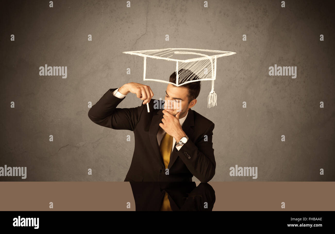 Happy college graduate drawing academic hat Stock Photo - Alamy