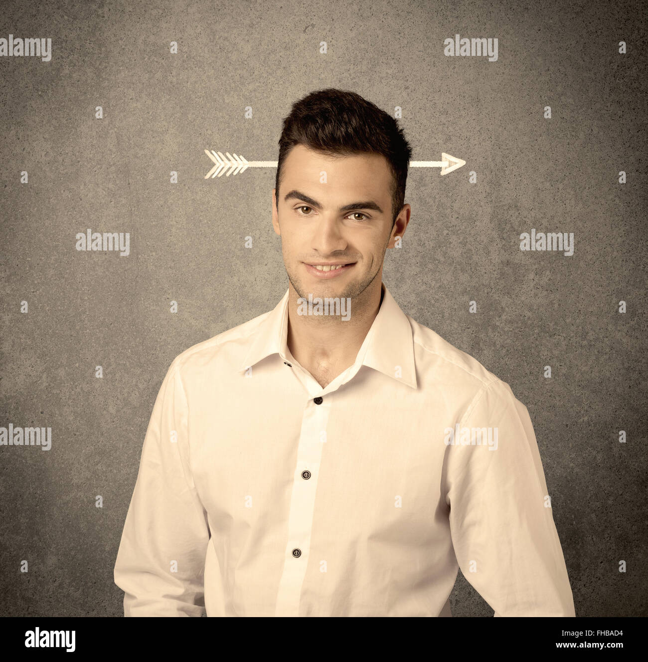 Young sales guy with arrow in the head Stock Photo - Alamy