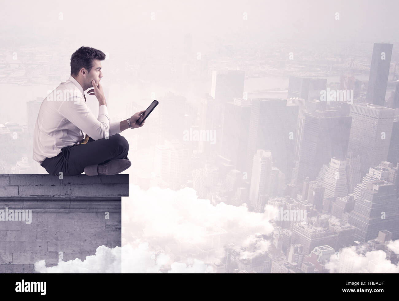 Businessman sitting edge hi-res stock photography and images - Alamy