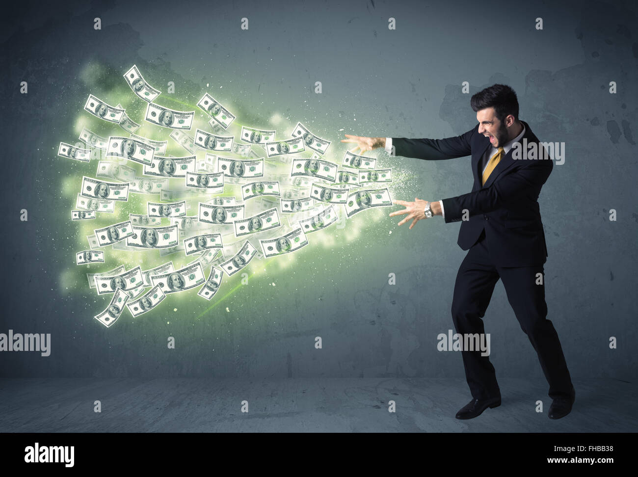 Business person throwing a lot of dollar bills concept Stock Photo - Alamy