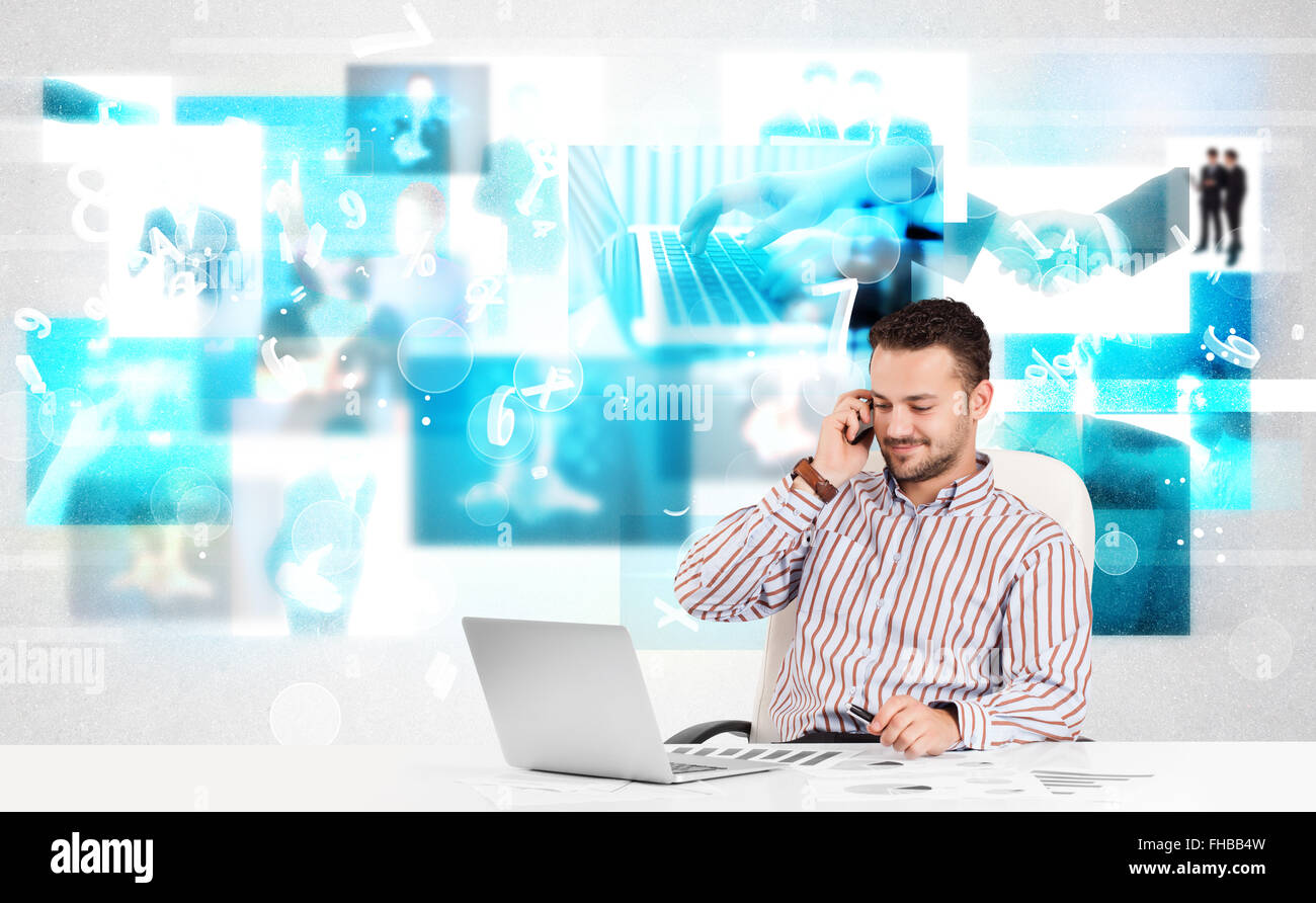 Business person at desk with modern tech images at background Stock ...