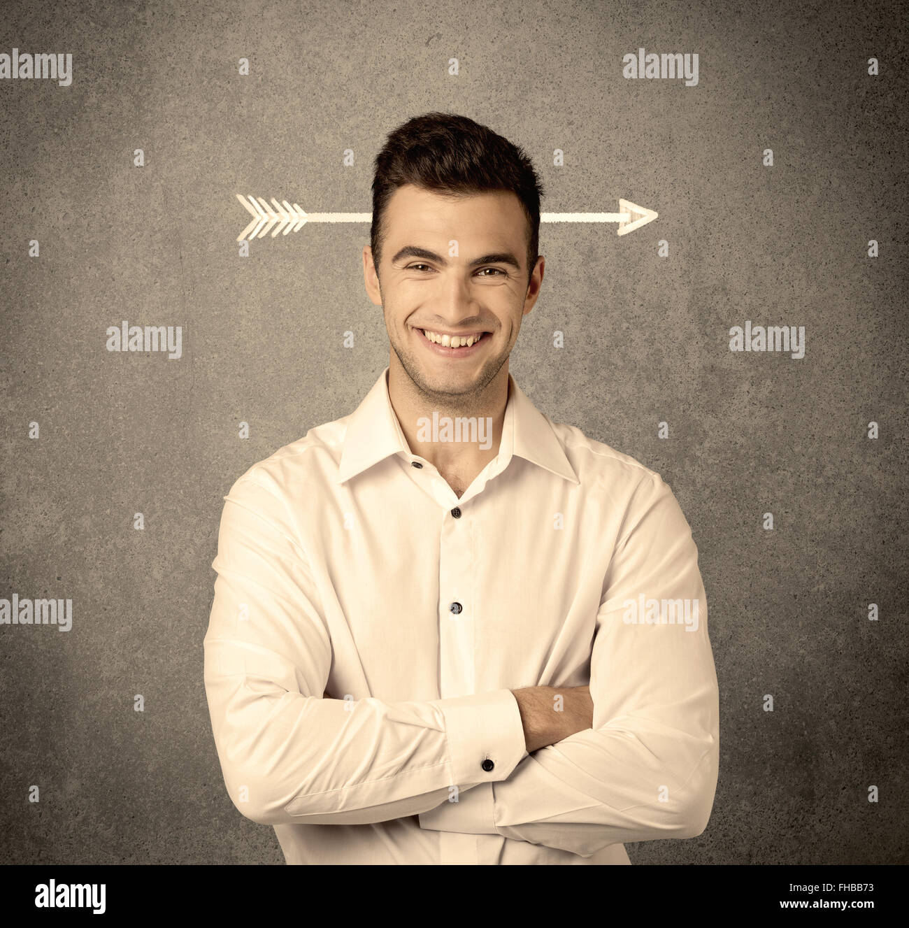 Young sales guy with arrow in the head Stock Photo - Alamy