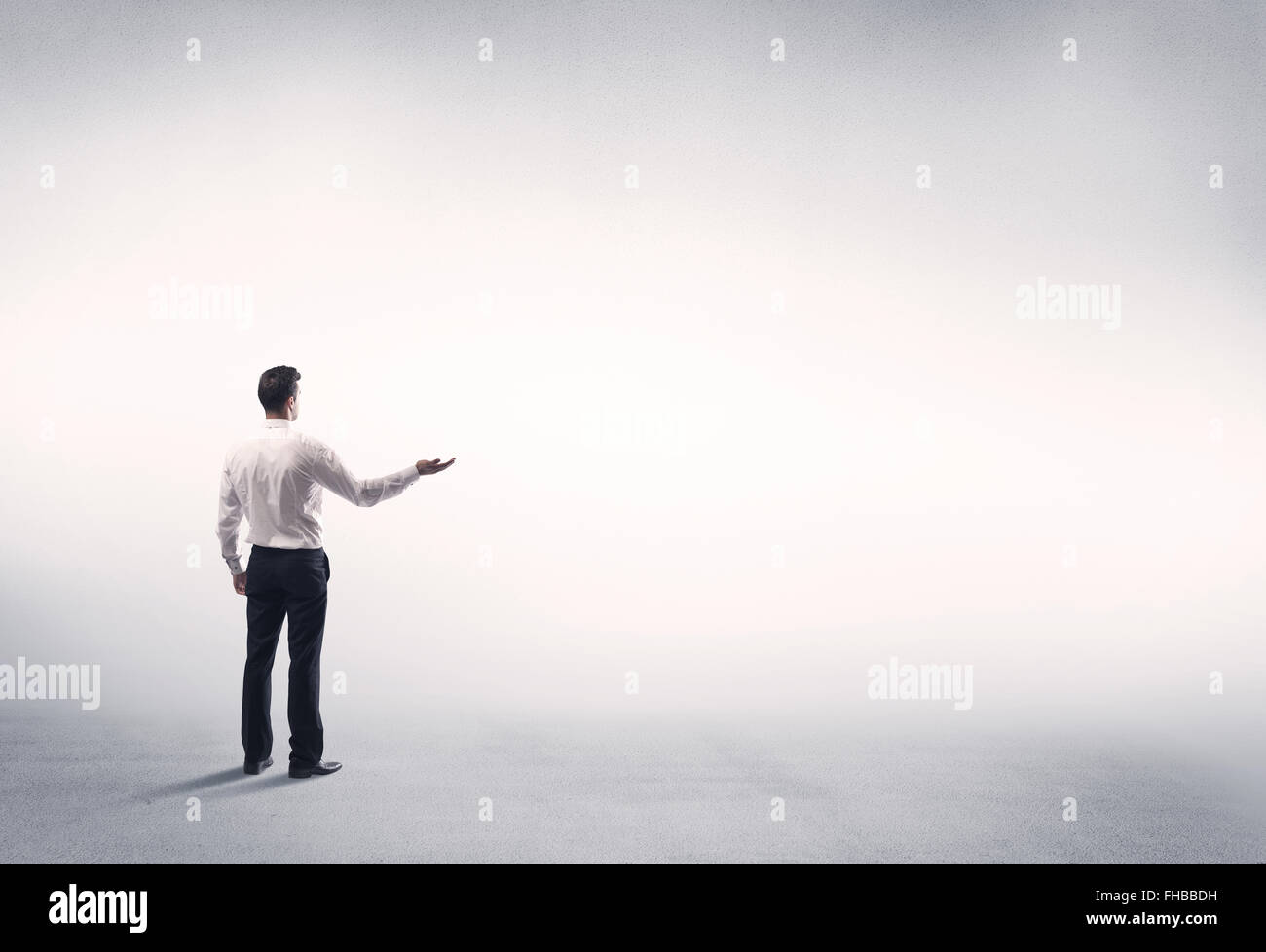 Sales person with empty white background Stock Photo - Alamy