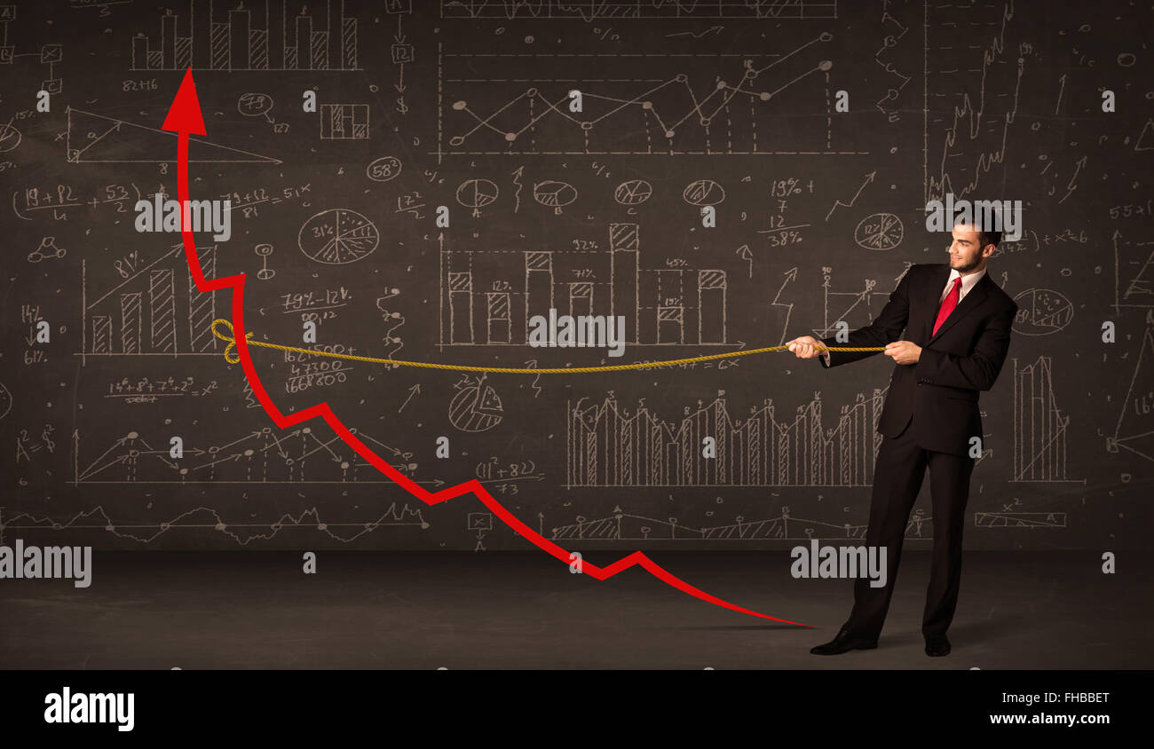 Businessman pulling a red arrow upright with a rope Stock Photo - Alamy