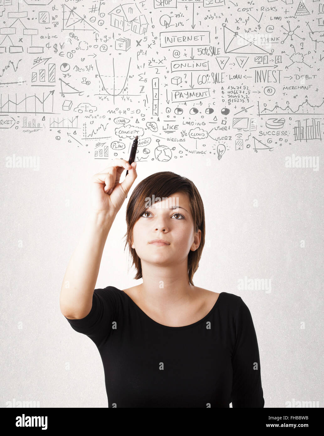 Young woman sketching and calculating thoughts Stock Photo - Alamy
