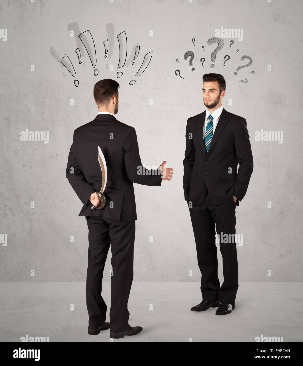 Ruthless business handshake Stock Photo - Alamy