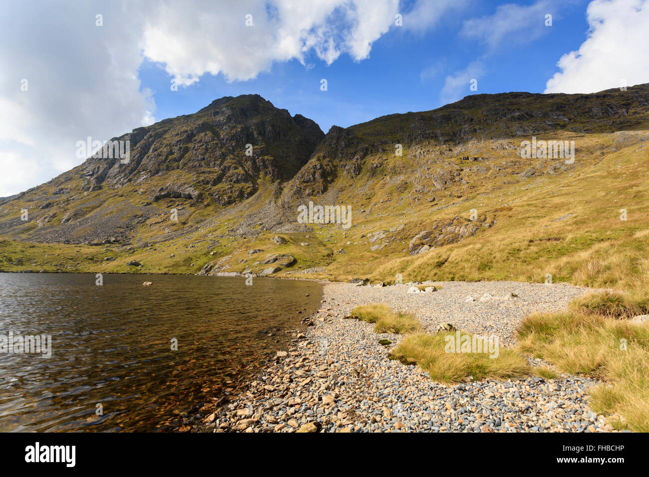 Llyn Dyfi, source of the River Dyfi which sits below the summit of Aran ...