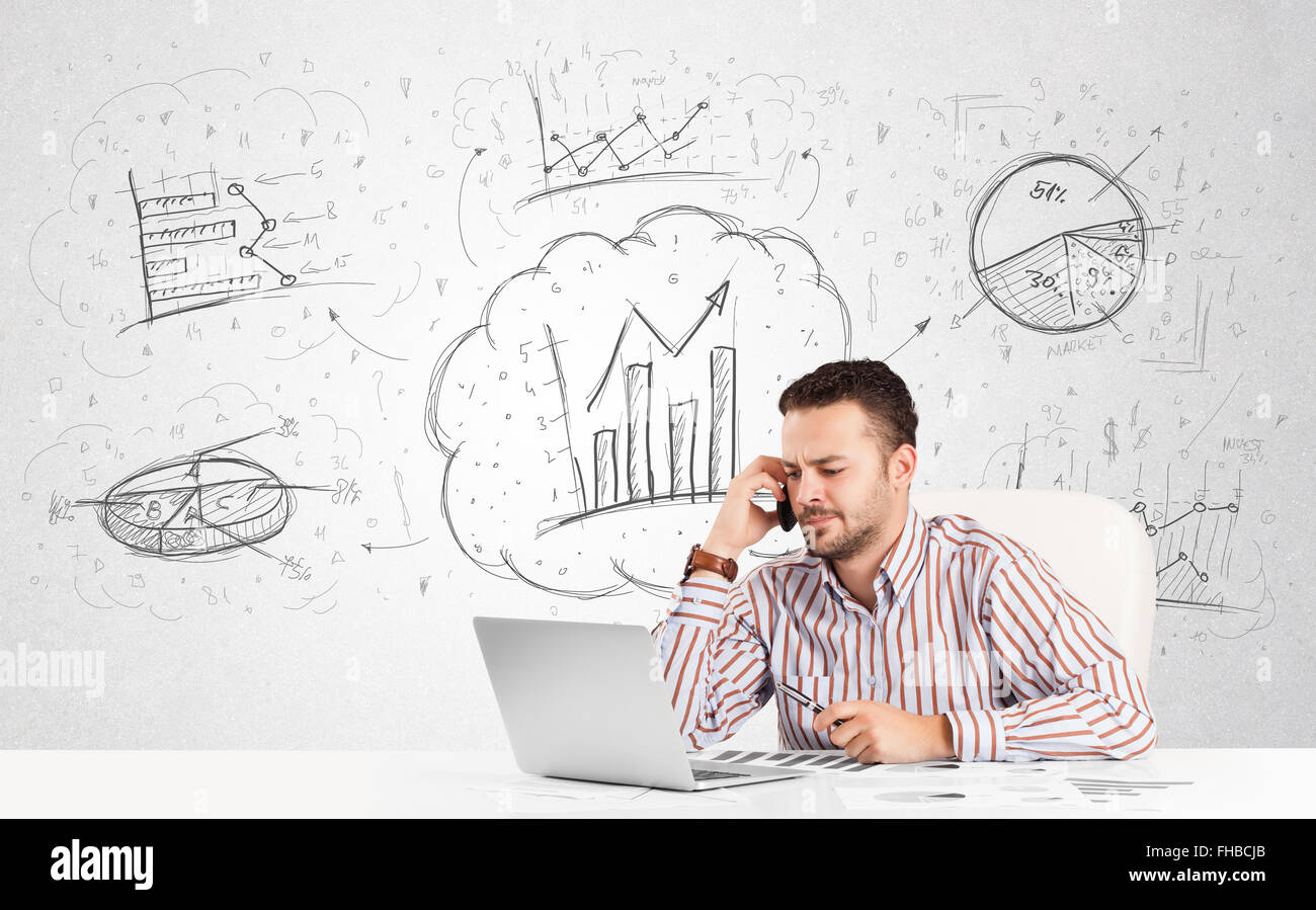 Business man sitting at table with hand drawn graph charts Stock Photo ...