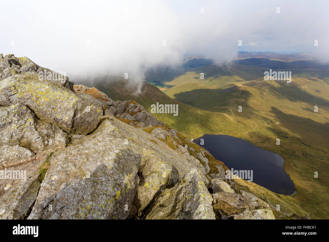 Llyn Dyfi, source of the River Dyfi which sits below the summit of Aran ...