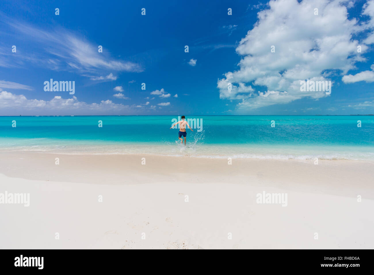 Man swimming in Cuba Stock Photo - Alamy