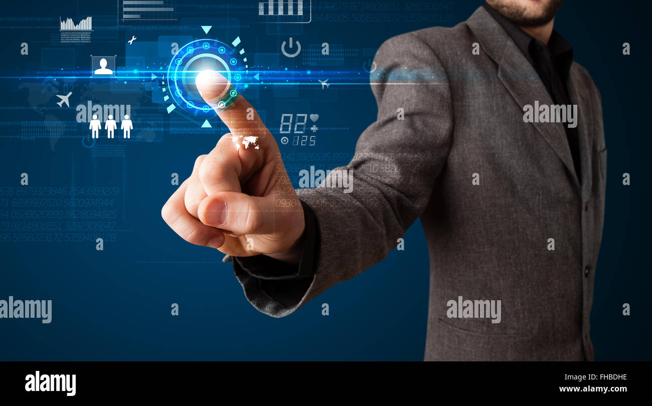 Handsome businessman touching future web technology buttons and icons ...