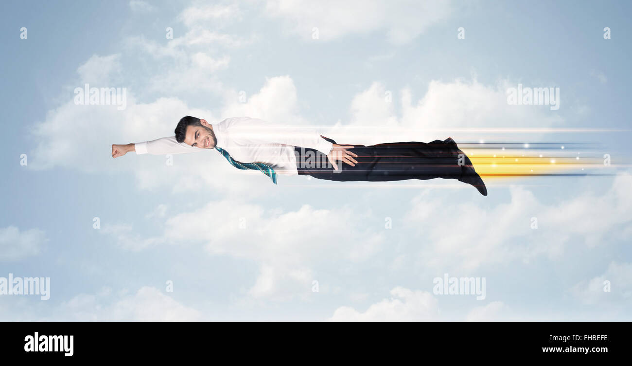 Happy business man flying fast on the sky between clouds Stock Photo ...
