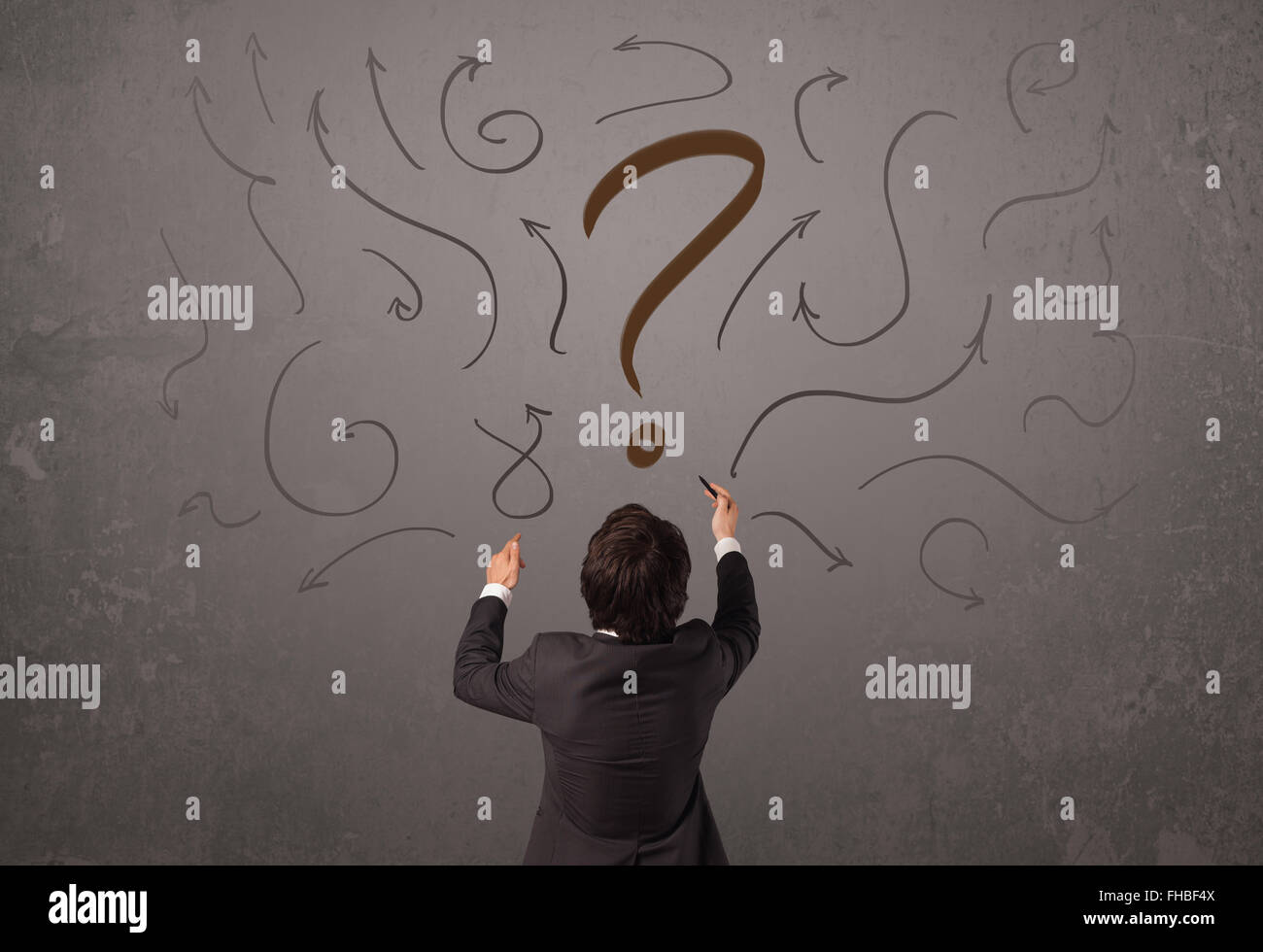 Business man looking at question mark sketch Stock Photo - Alamy
