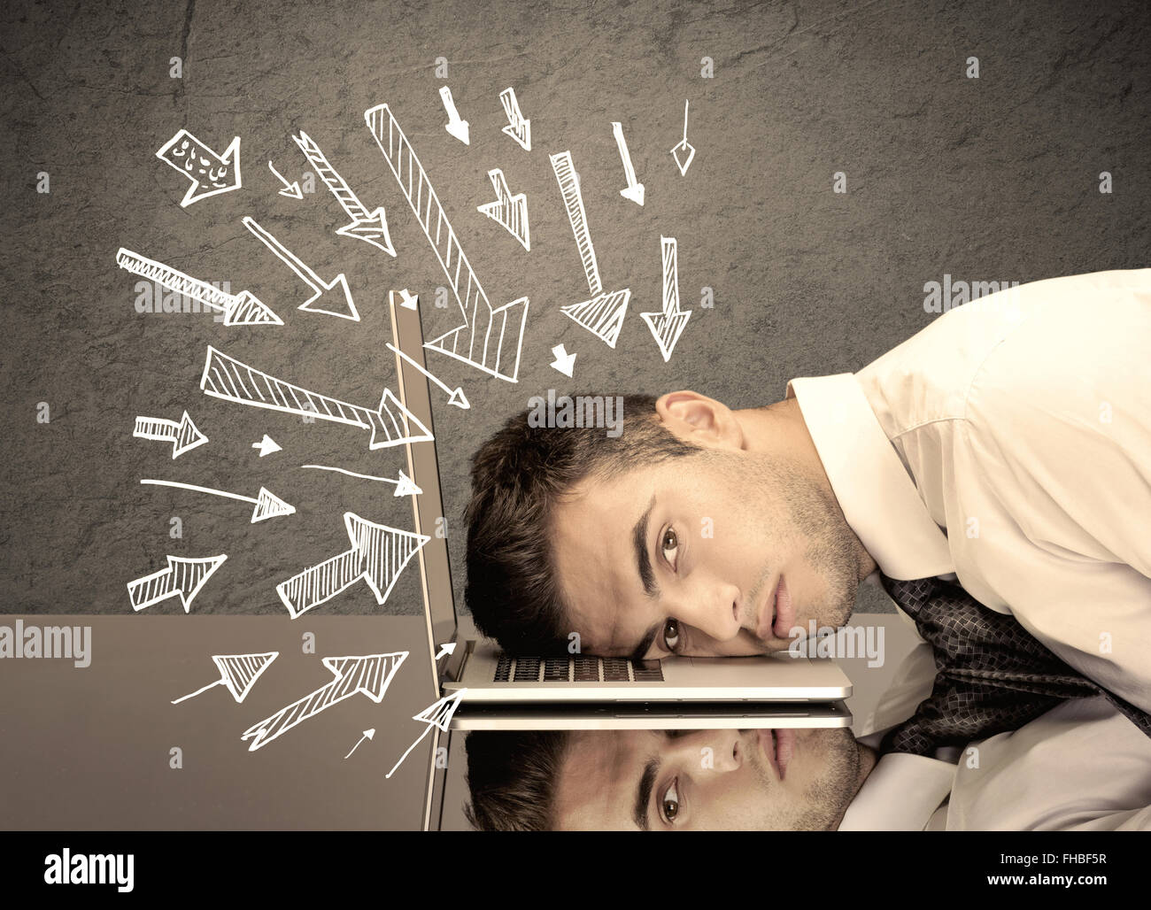 Arrows pointing at sad office worker Stock Photo - Alamy