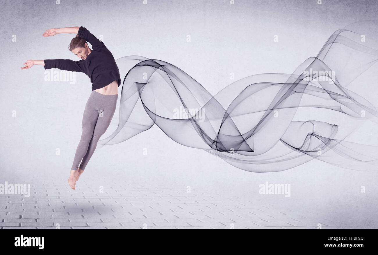 Modern ballet dancer performing with abstract swirl Stock Photo - Alamy