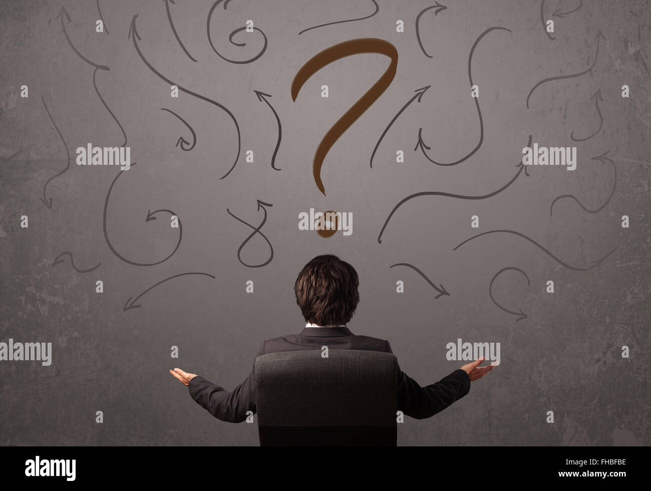 Business man looking at question mark sketch Stock Photo - Alamy