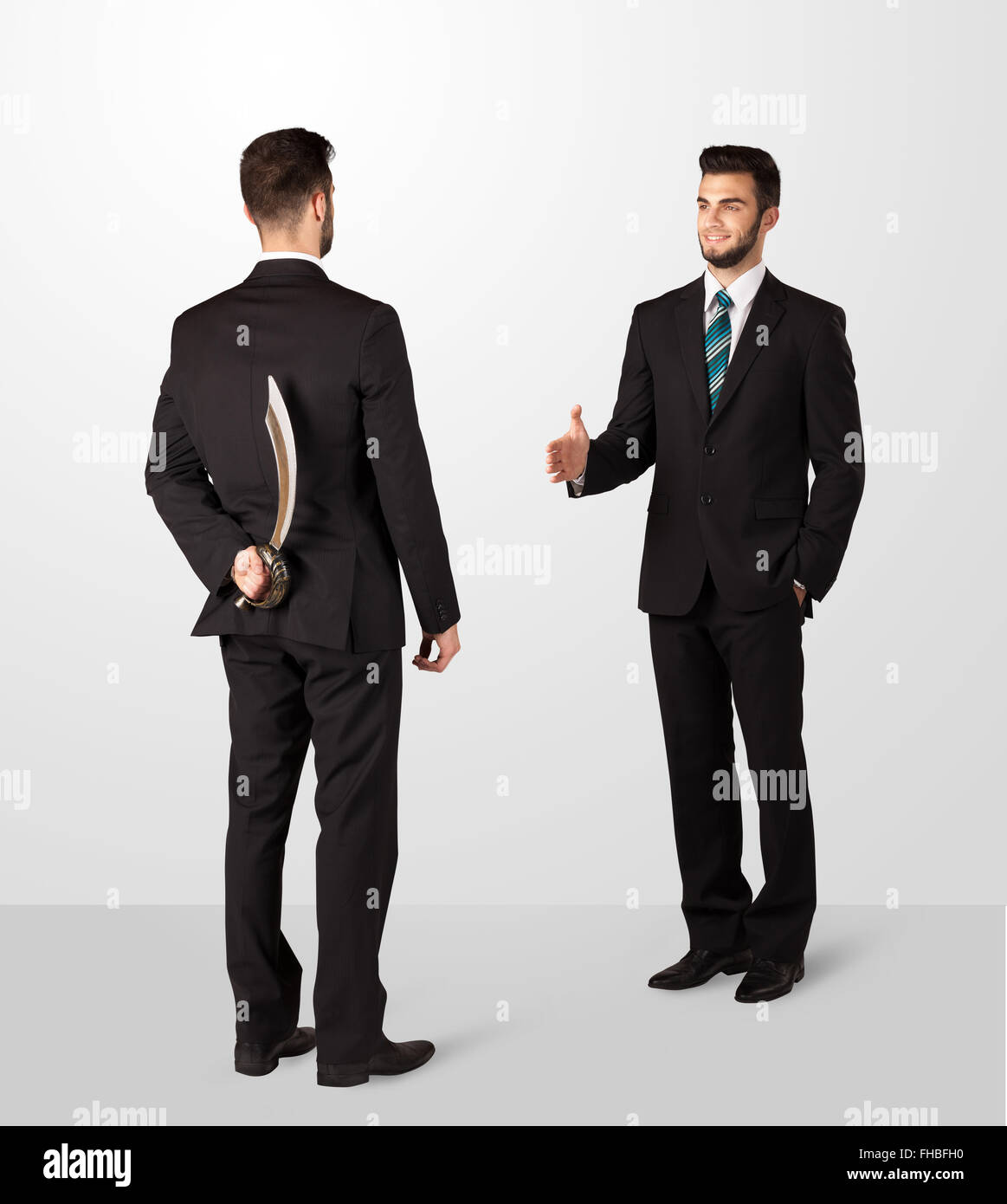 Two businessman shake hands Stock Photo - Alamy