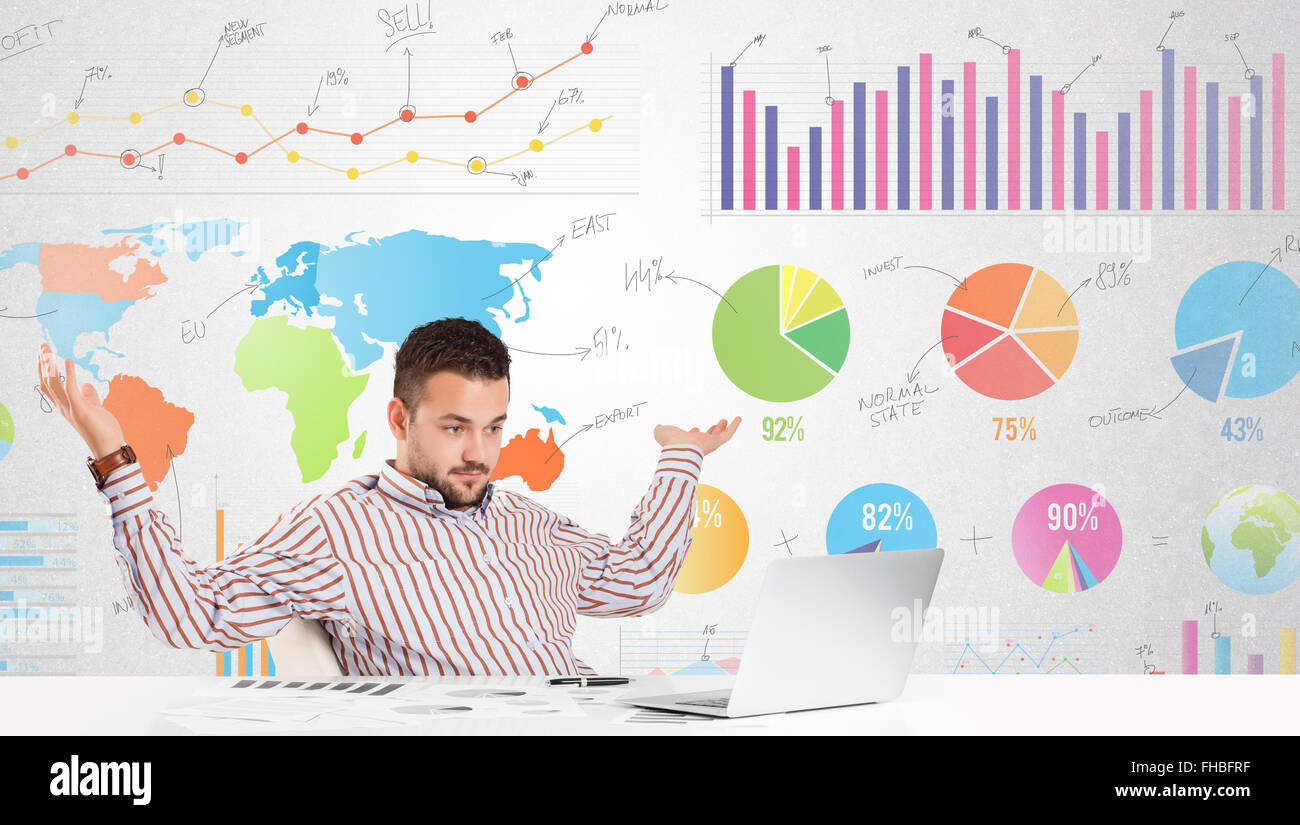 Business man with colorful charts Stock Photo - Alamy