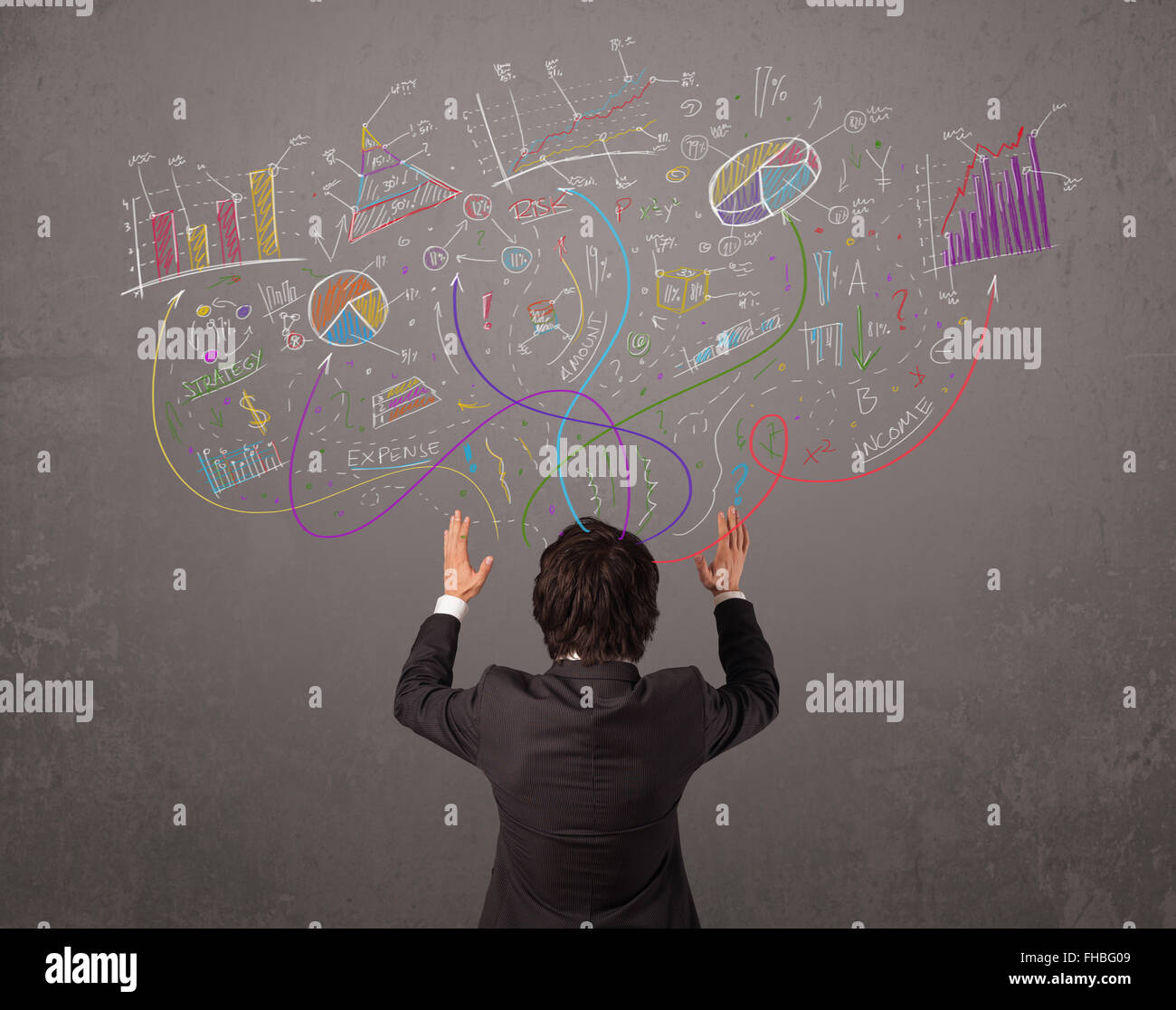 Young business man looking at sketches of graphs and symbols Stock ...
