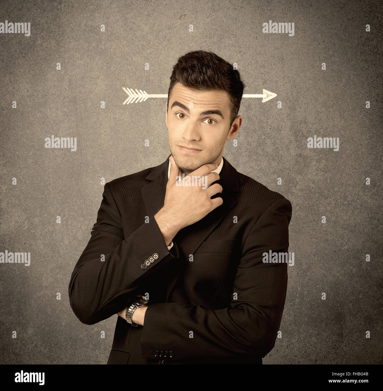 Young sales guy with arrow in the head Stock Photo - Alamy