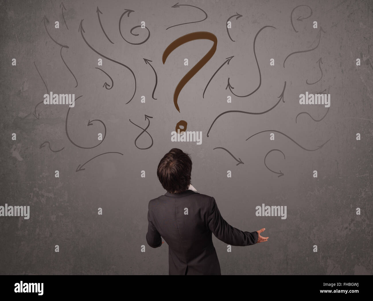 Business man looking at question mark sketch Stock Photo - Alamy