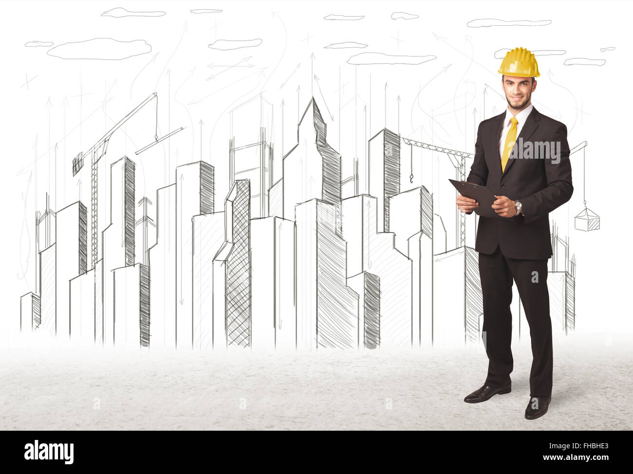 Engineer man with building city drawing in background Stock Photo - Alamy
