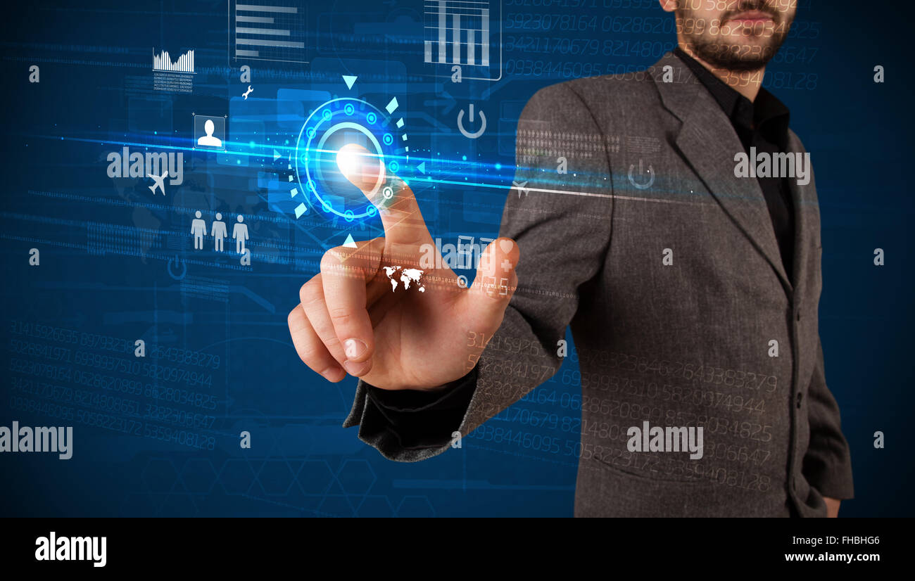 Handsome businessman touching future web technology buttons and icons ...