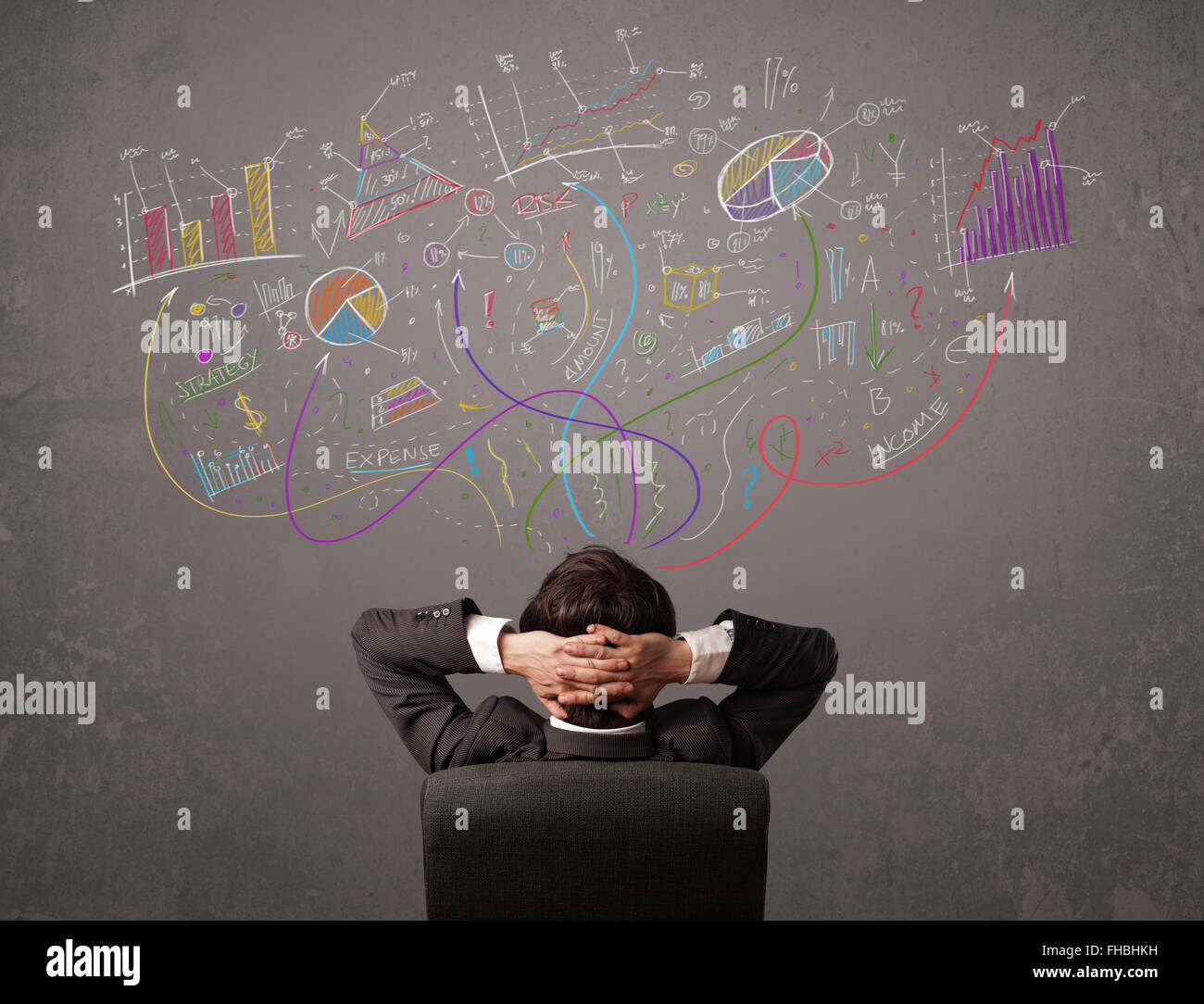 Young business man looking at sketches of graphs and symbols Stock ...