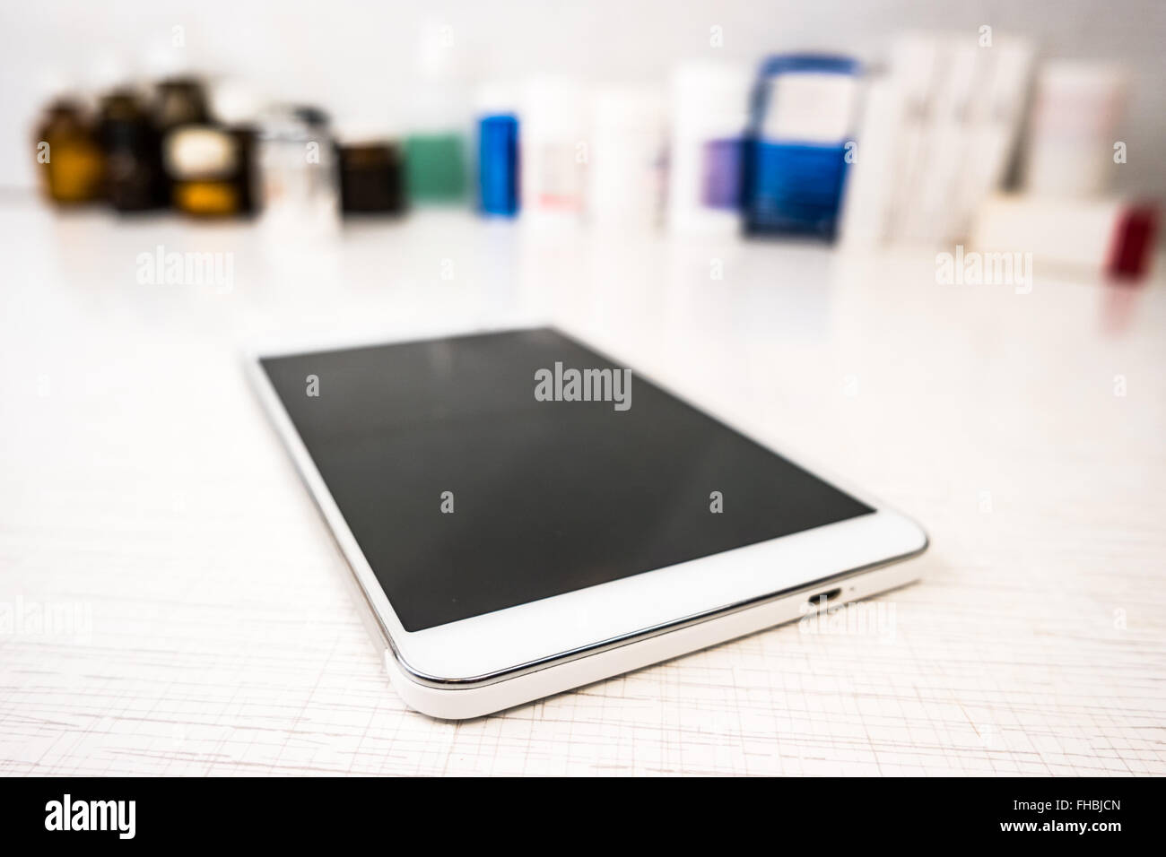 Tablet pc with medical objects Stock Photo - Alamy