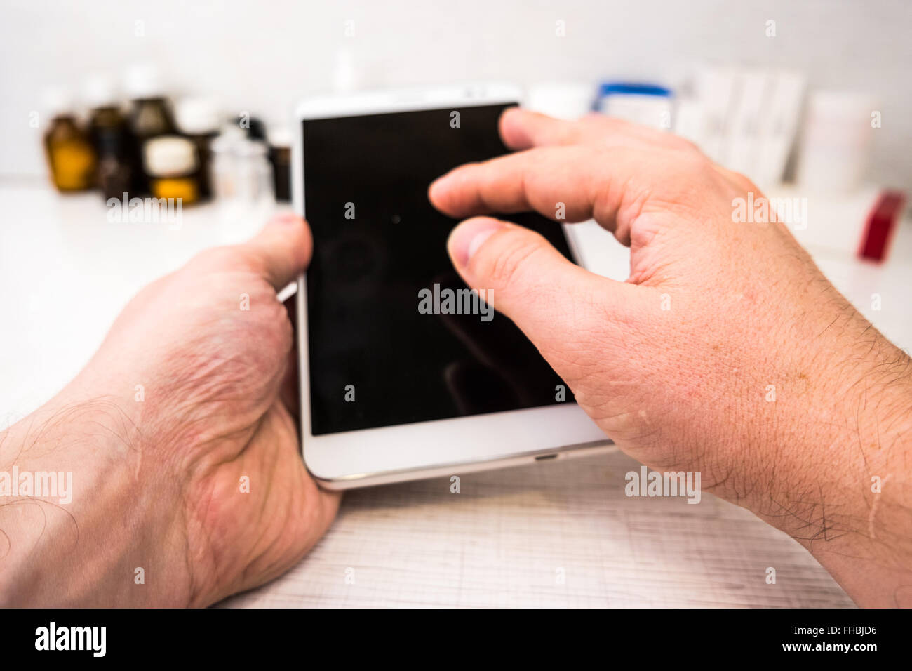 Tablet pc with medical objects Stock Photo - Alamy