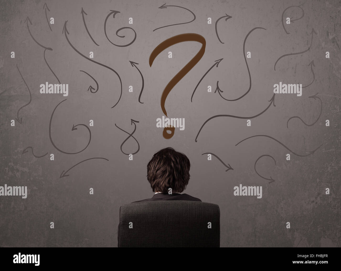 Business man looking at question mark sketch Stock Photo - Alamy