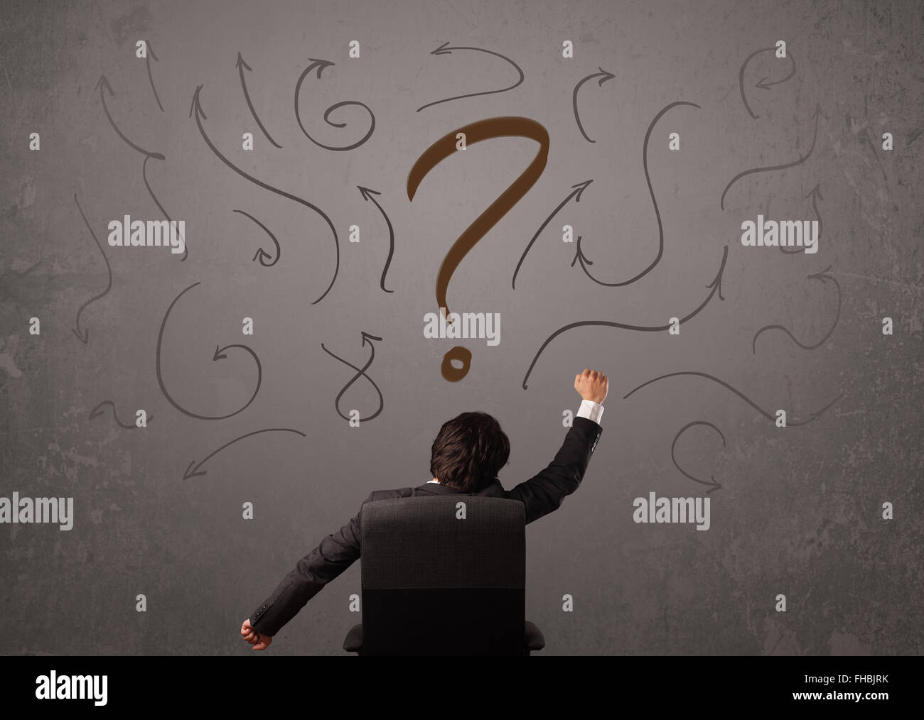 Business man looking at question mark sketch Stock Photo - Alamy