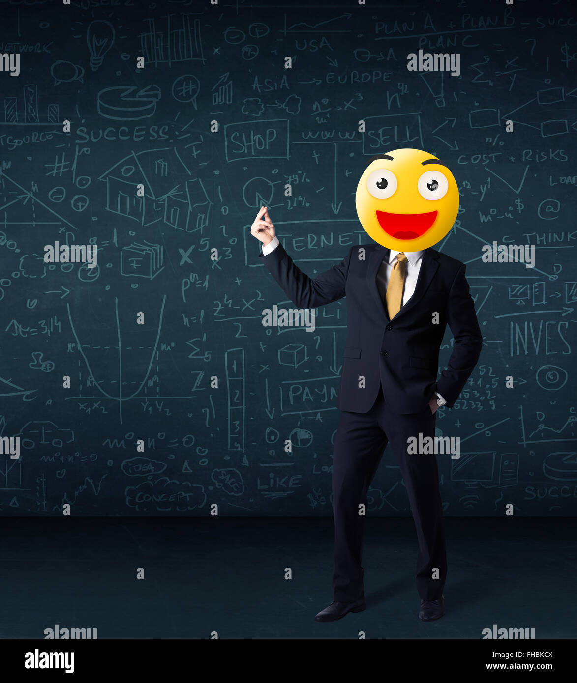 businessman wears yellow smiley face Stock Photo - Alamy
