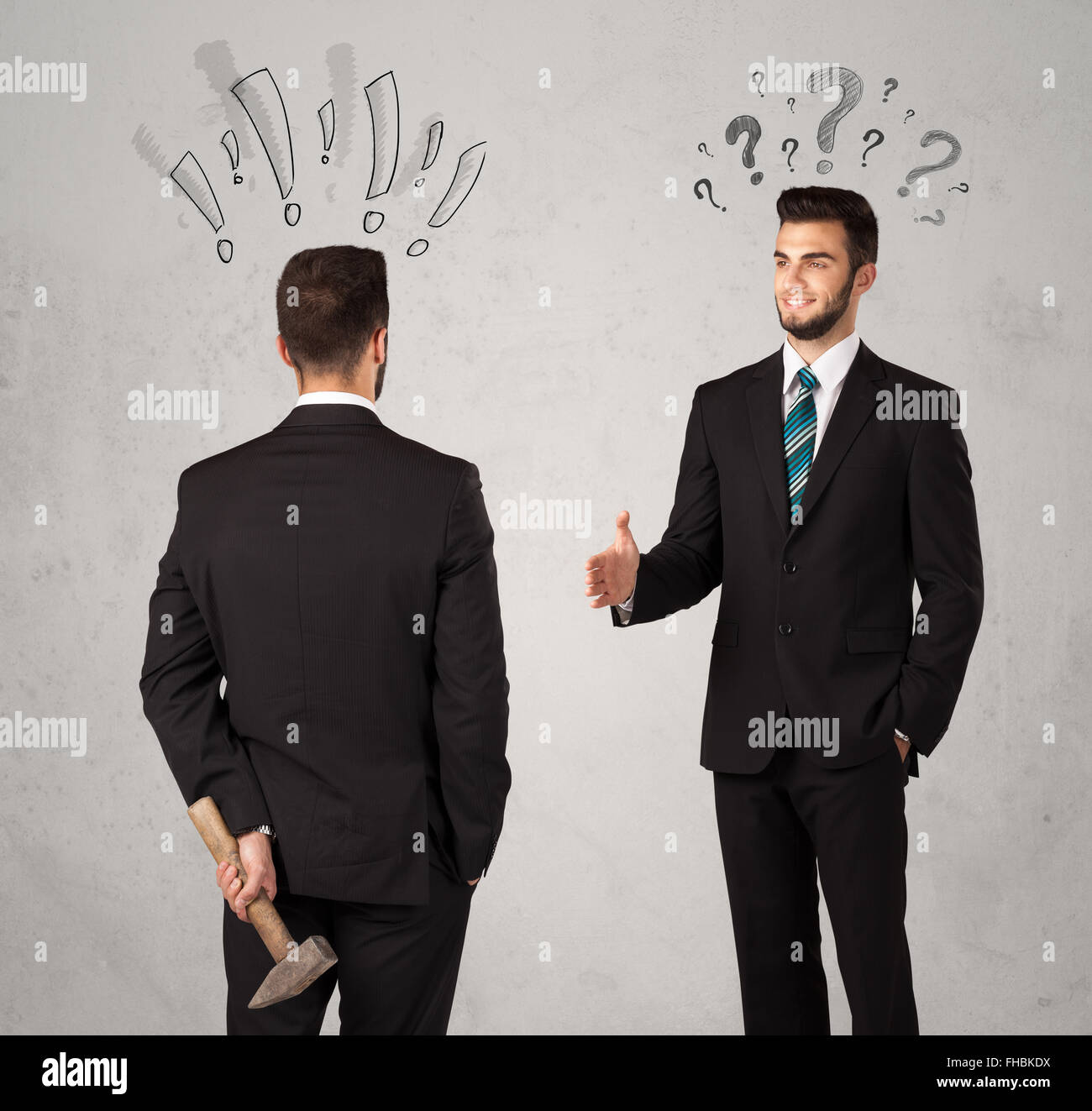 Ruthless business handshake Stock Photo - Alamy