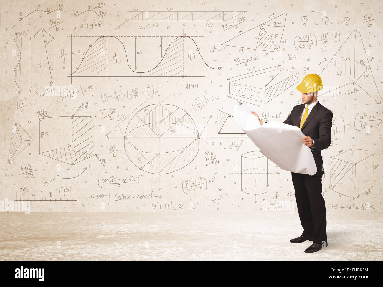 Handsome engineer calculating with hand drawn background Stock Photo ...