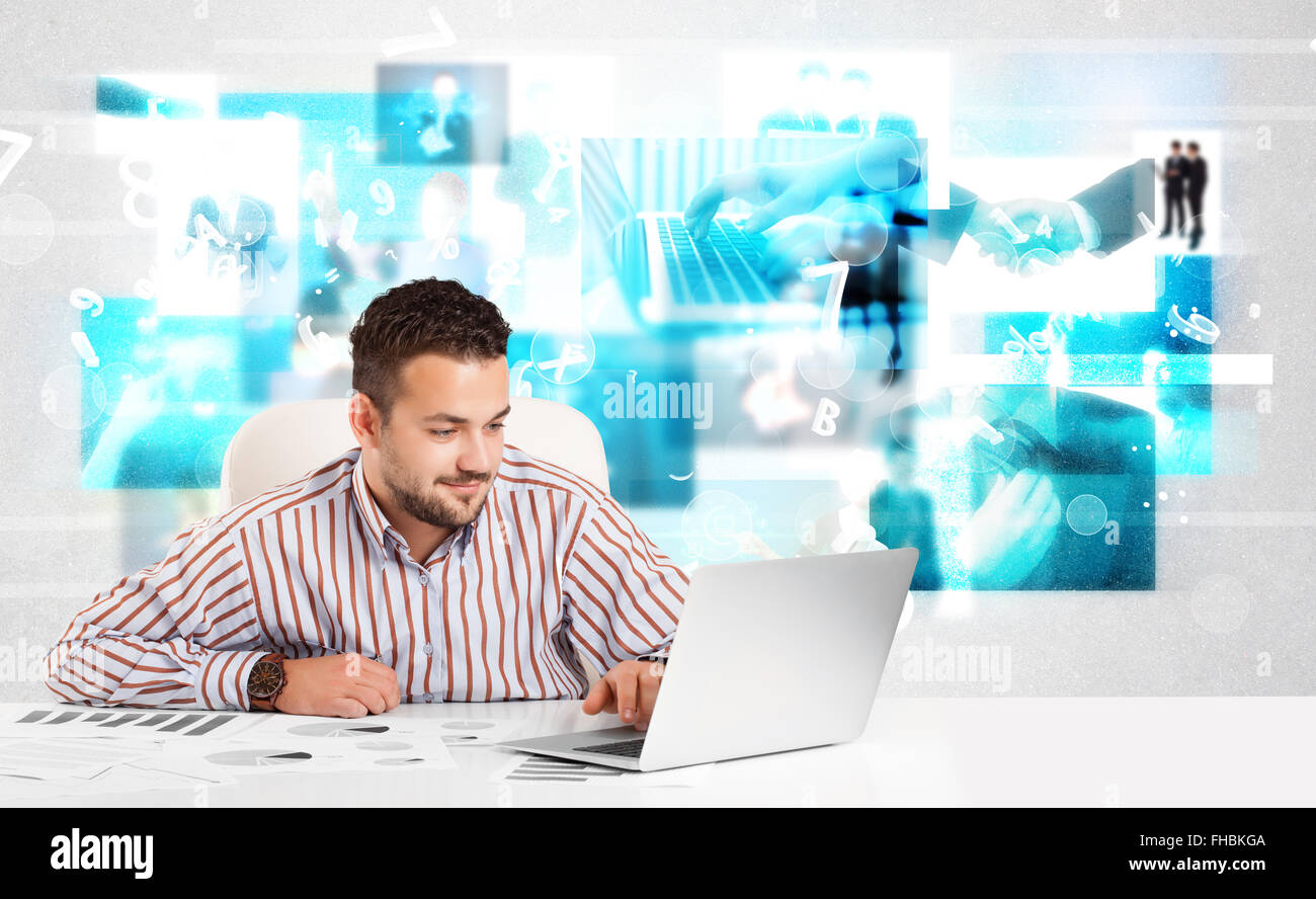 Business person at desk with modern tech images at background Stock ...