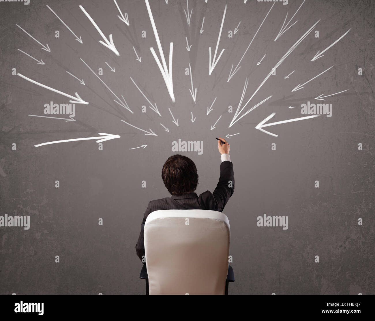 Business man with hand drawn arrows pointing at his head Stock Photo ...