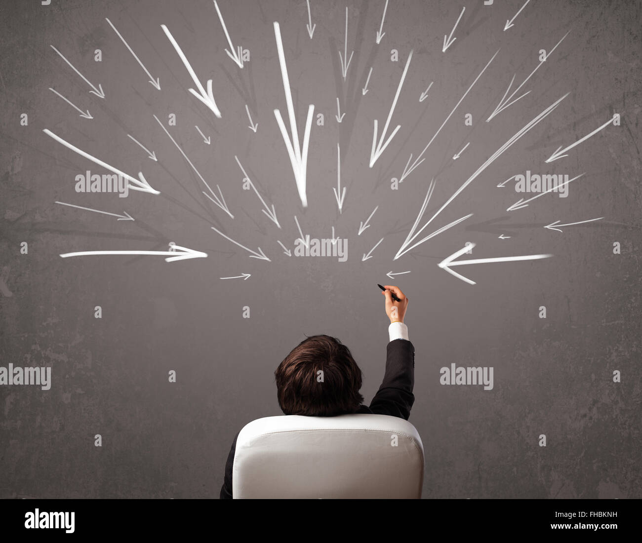 Business man with hand drawn arrows pointing at his head Stock Photo ...