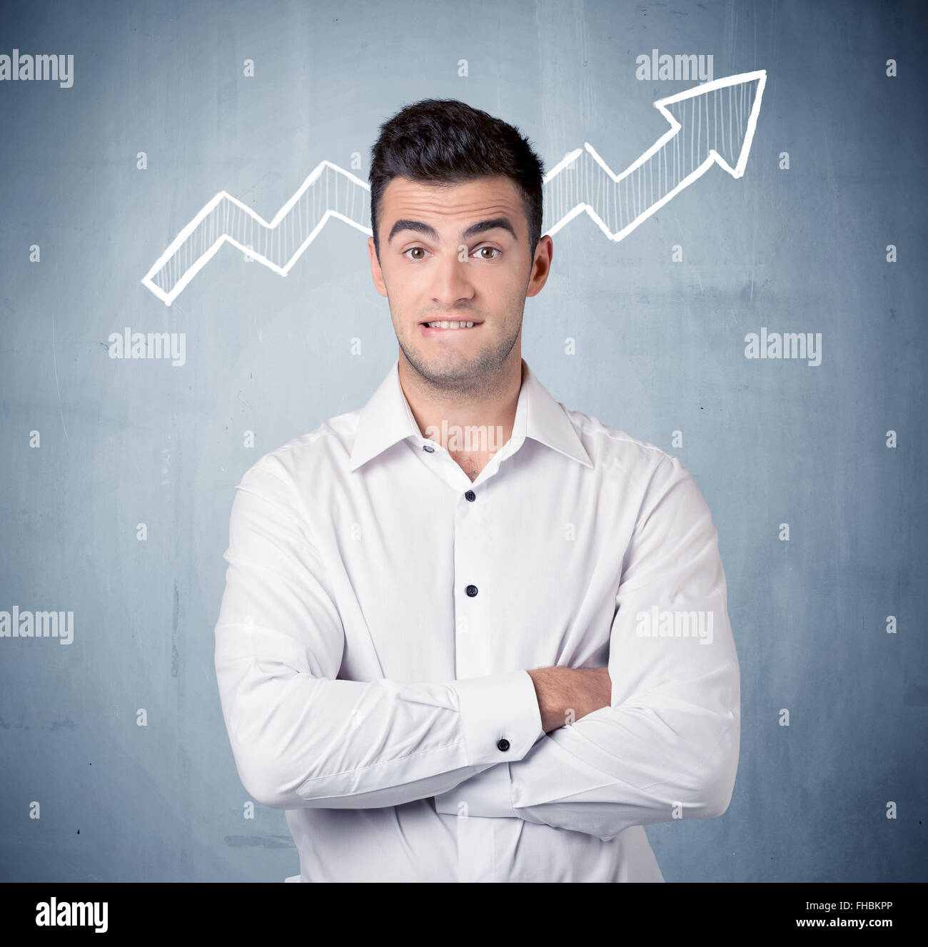 Smiling business guy with graph arrow Stock Photo - Alamy