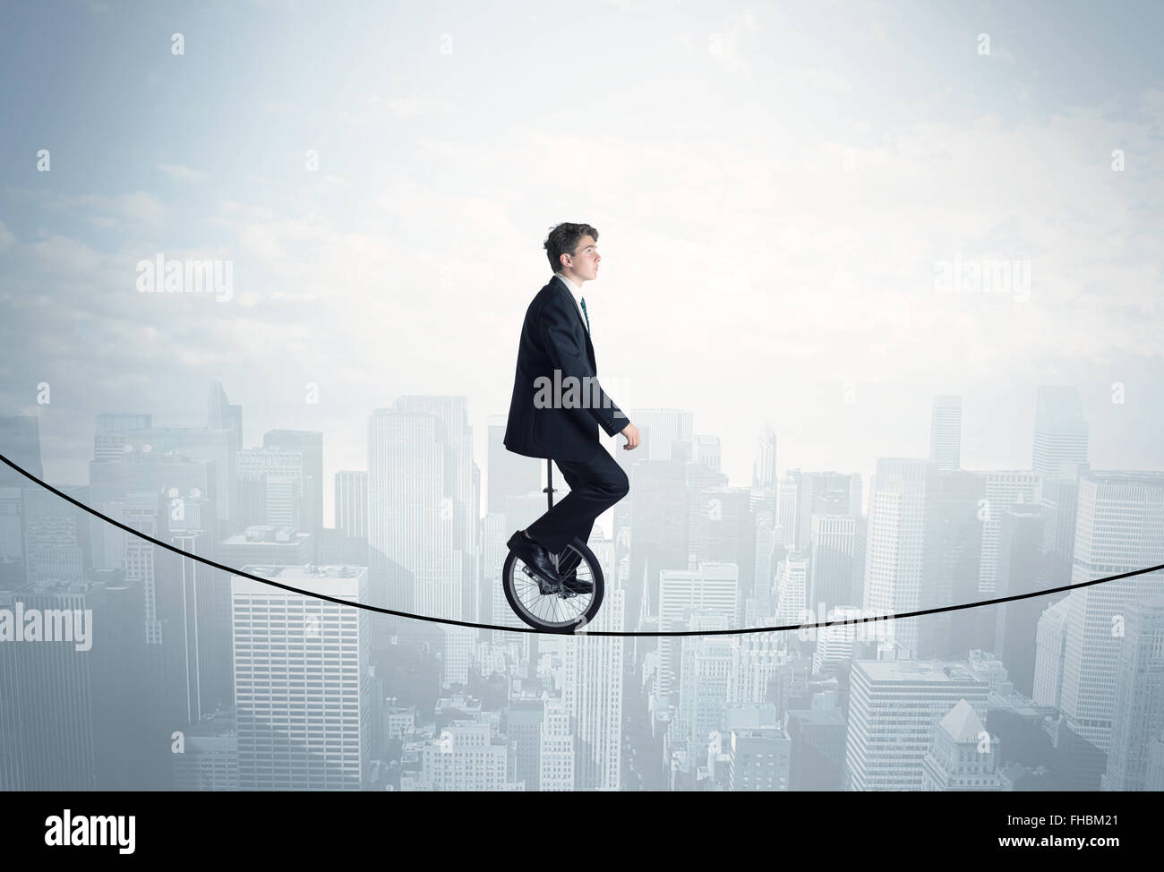 Brave business man riding mono hi-res stock photography and images - Alamy